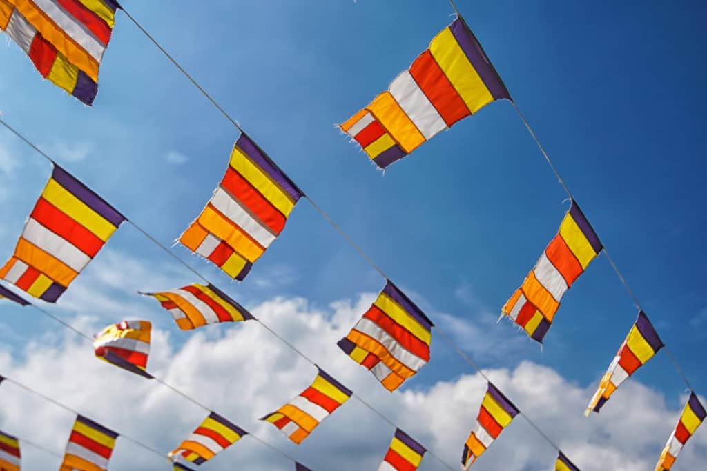 The History and Meaning of the Buddhist Flag - Buddhism Info